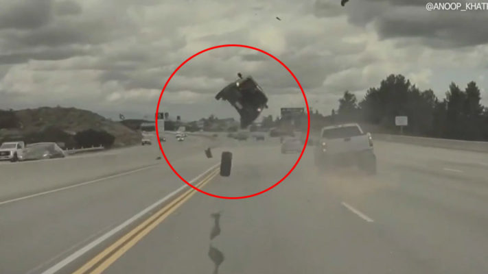 Car goes airborne on Los Angeles highway after tire on pickup car ...