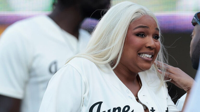 Lizzo Embraces Body Positivity with Bold Paris Looks and Back Fat Pride